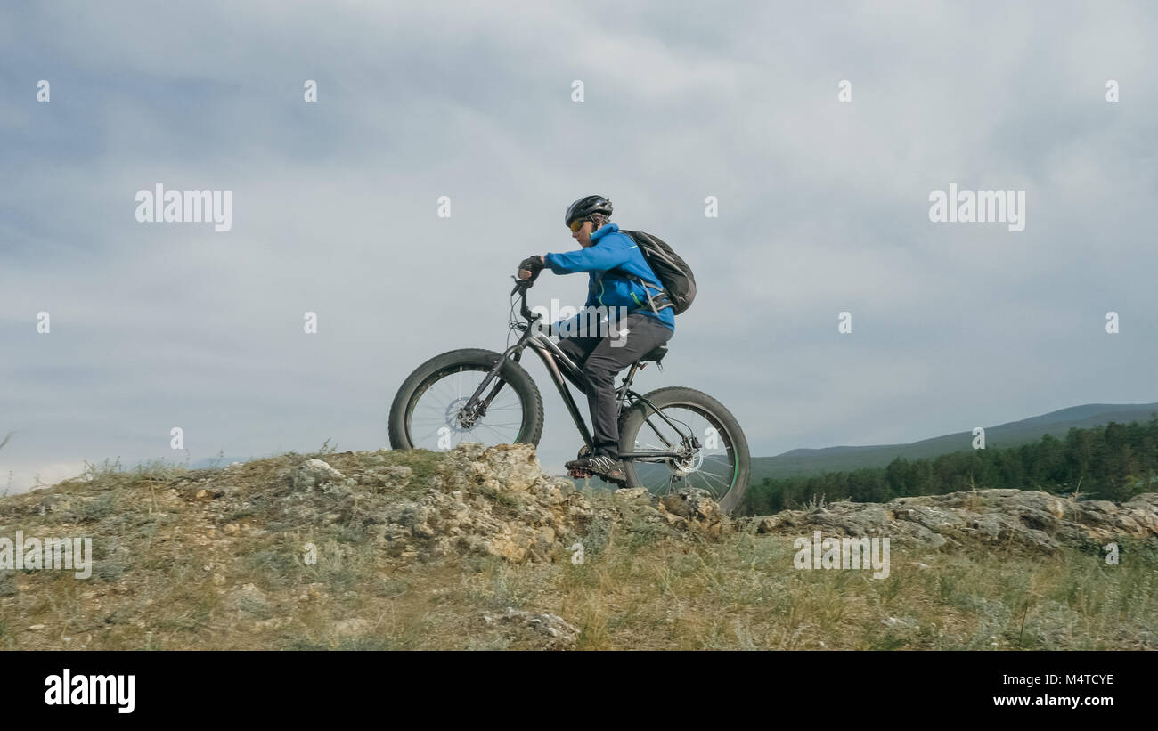Fat bike also called fatbike or fat-tire bike in summer driving the ...