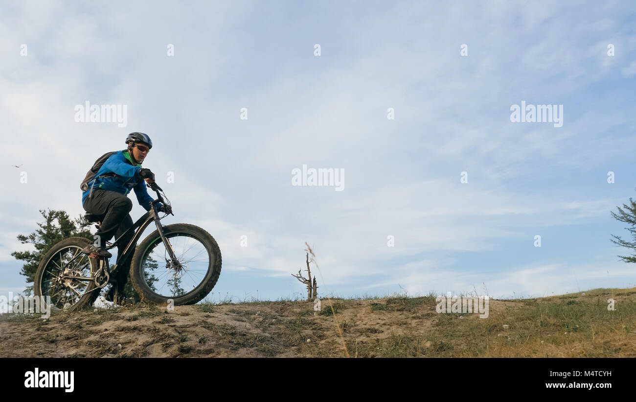 Fat bike also called fatbike or fat-tire bike in summer driving the ...