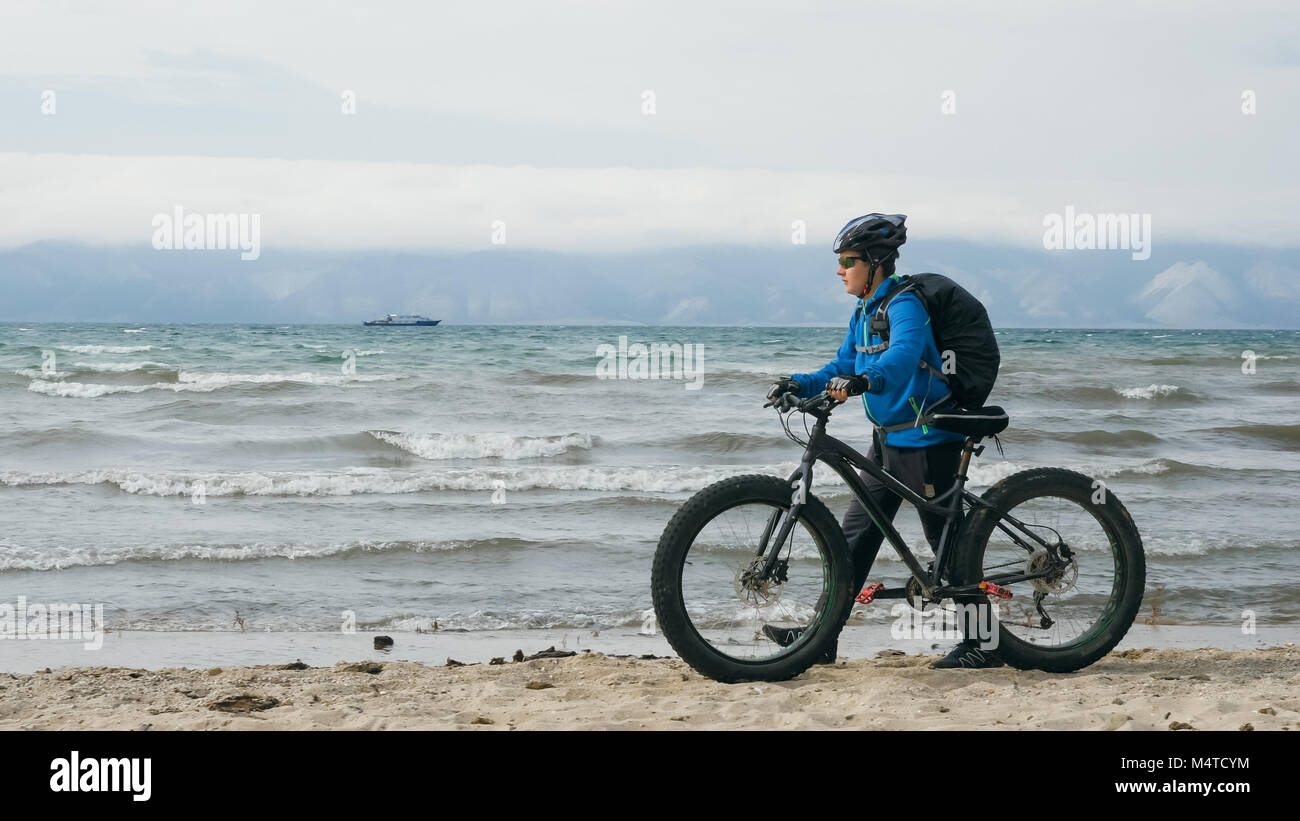 Fat bike also called fatbike or fat-tire bike in summer driving on the ...