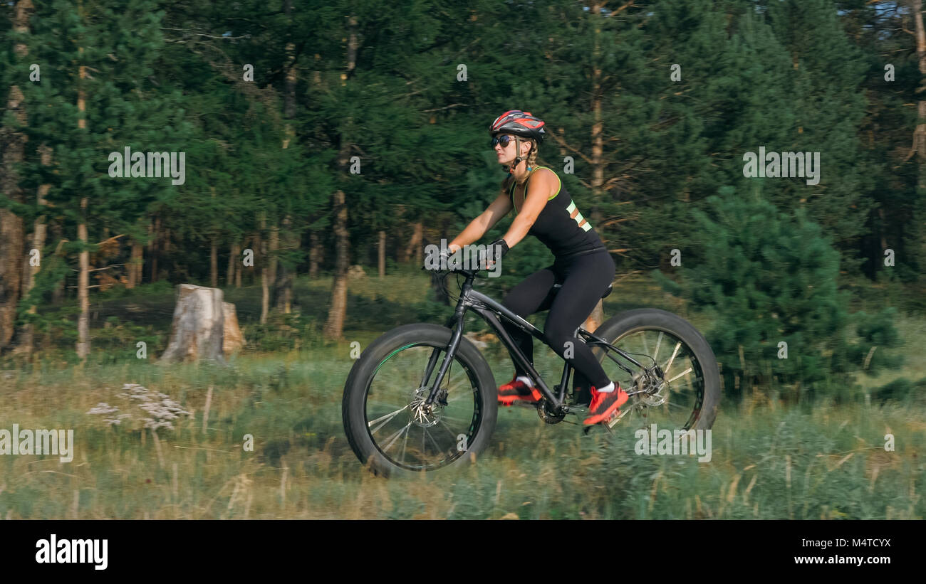 Fat bike also called fatbike or fat-tire bike in summer riding in the ...