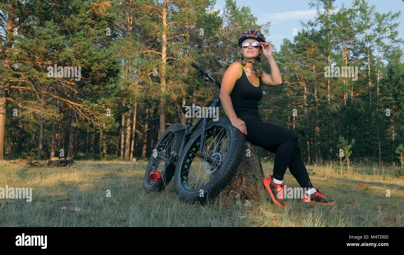 Fat bike also called fatbike or fat-tire bike in summer riding in the ...