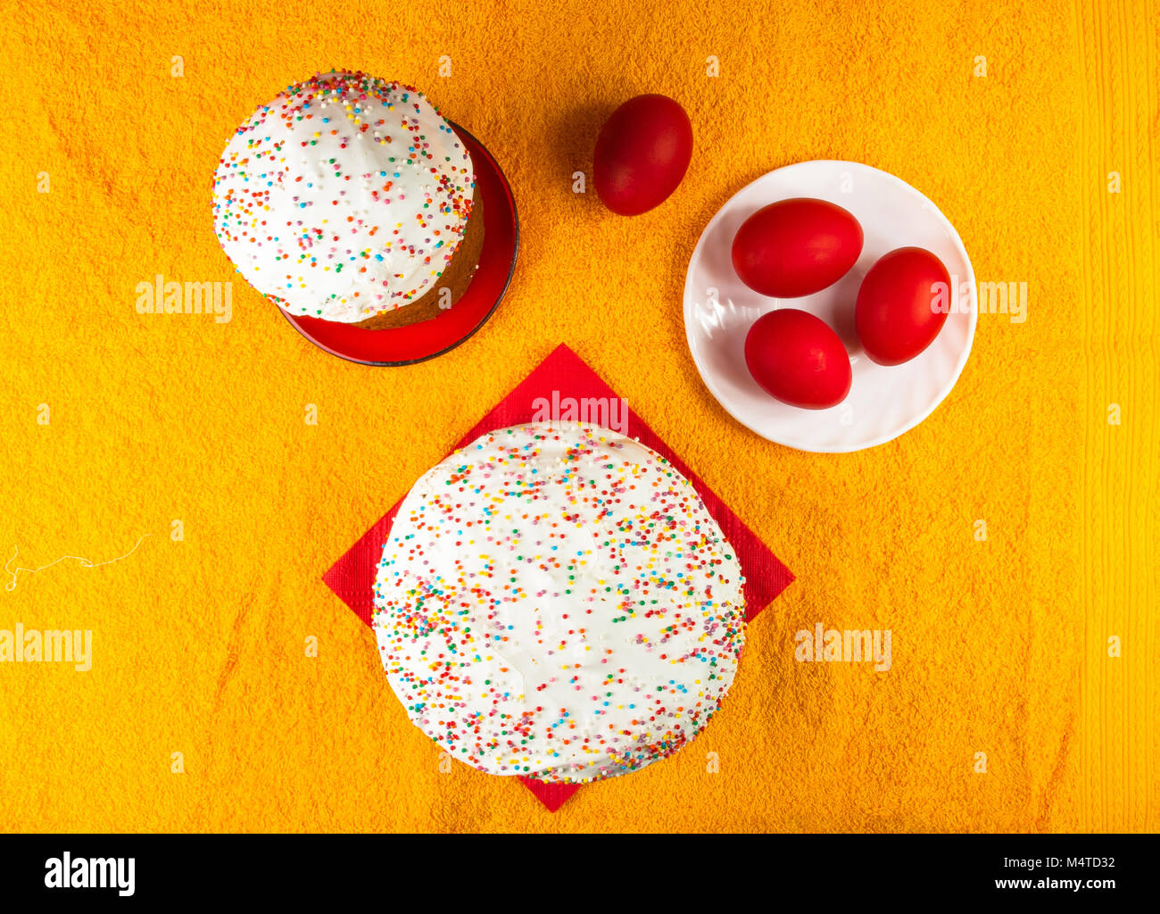 Kulichi, traditional Russian Easter cake with icing and dyed eggs Stock ...