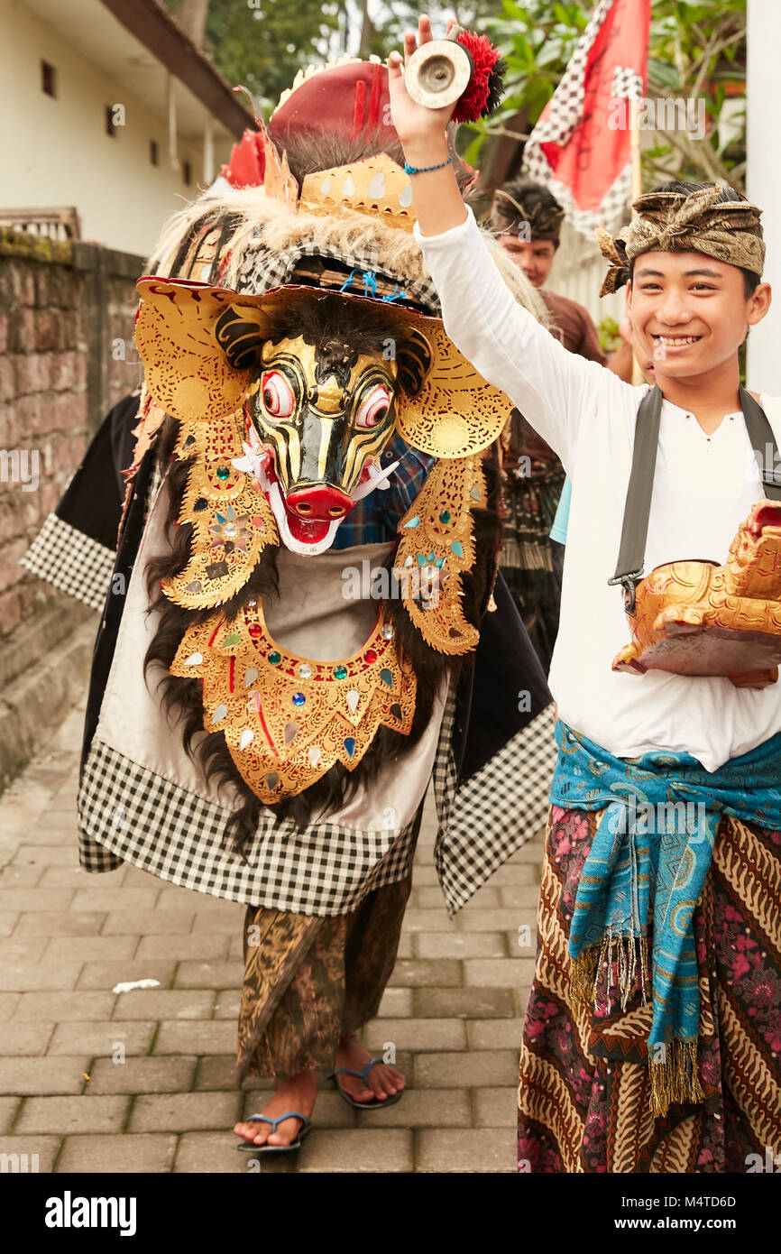 Local indonesian boys performing traditional lion dance with musical ...