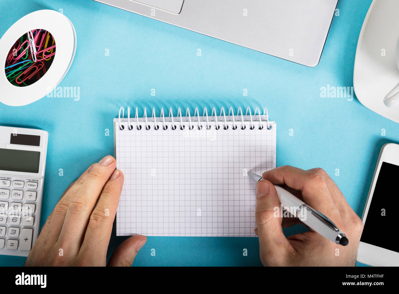With a notepad for writing hi-res stock photography and images - Alamy