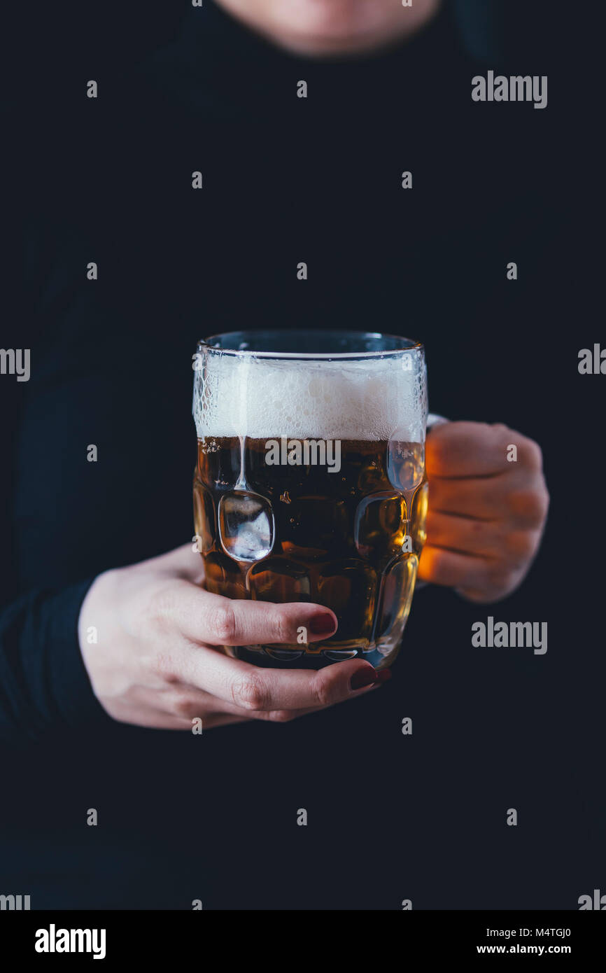 Woman hand holding beer hi-res stock photography and images - Alamy