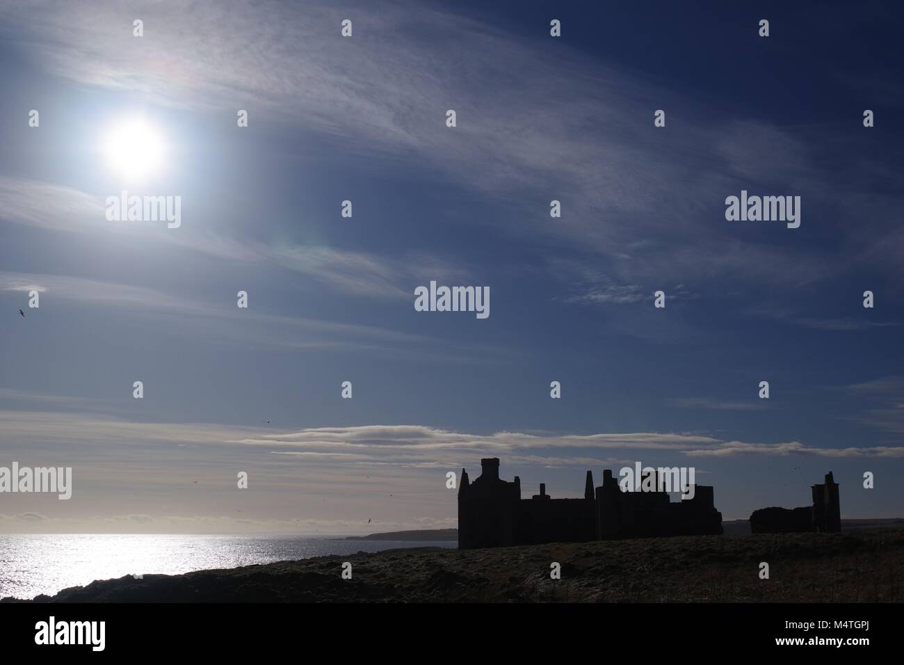 New Slains Castle Ruin Silhouetted atop the Rugged Granite Cliffs ...