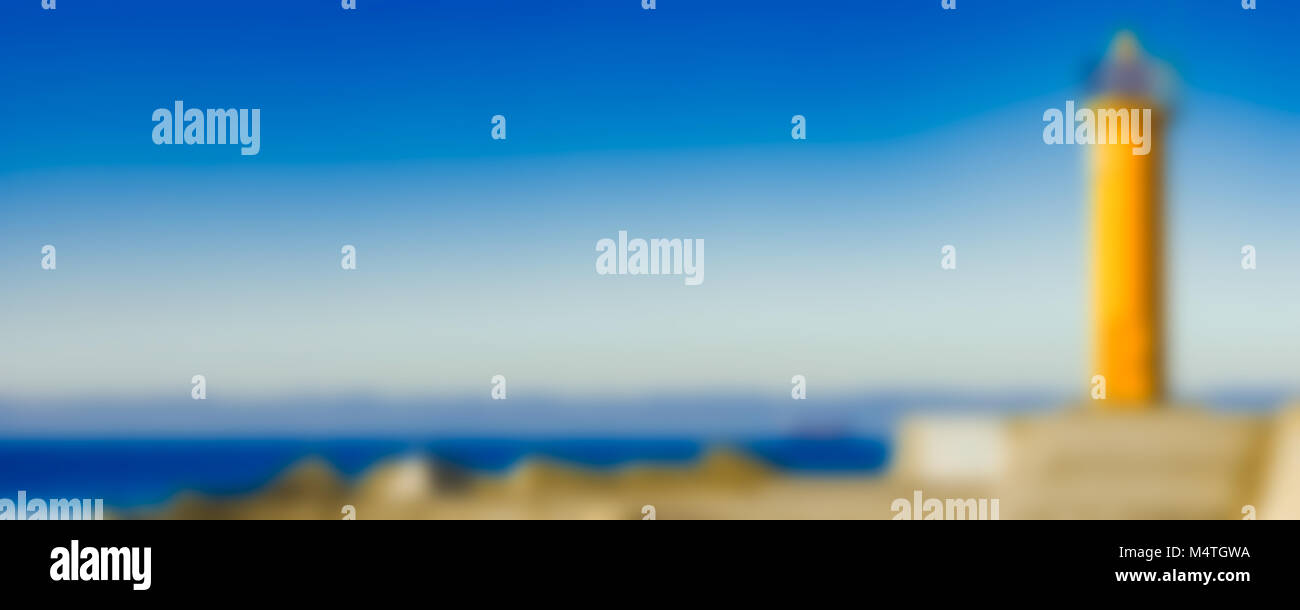 Yellow lighthouse - soft lens bokeh image. Defocused background Stock ...