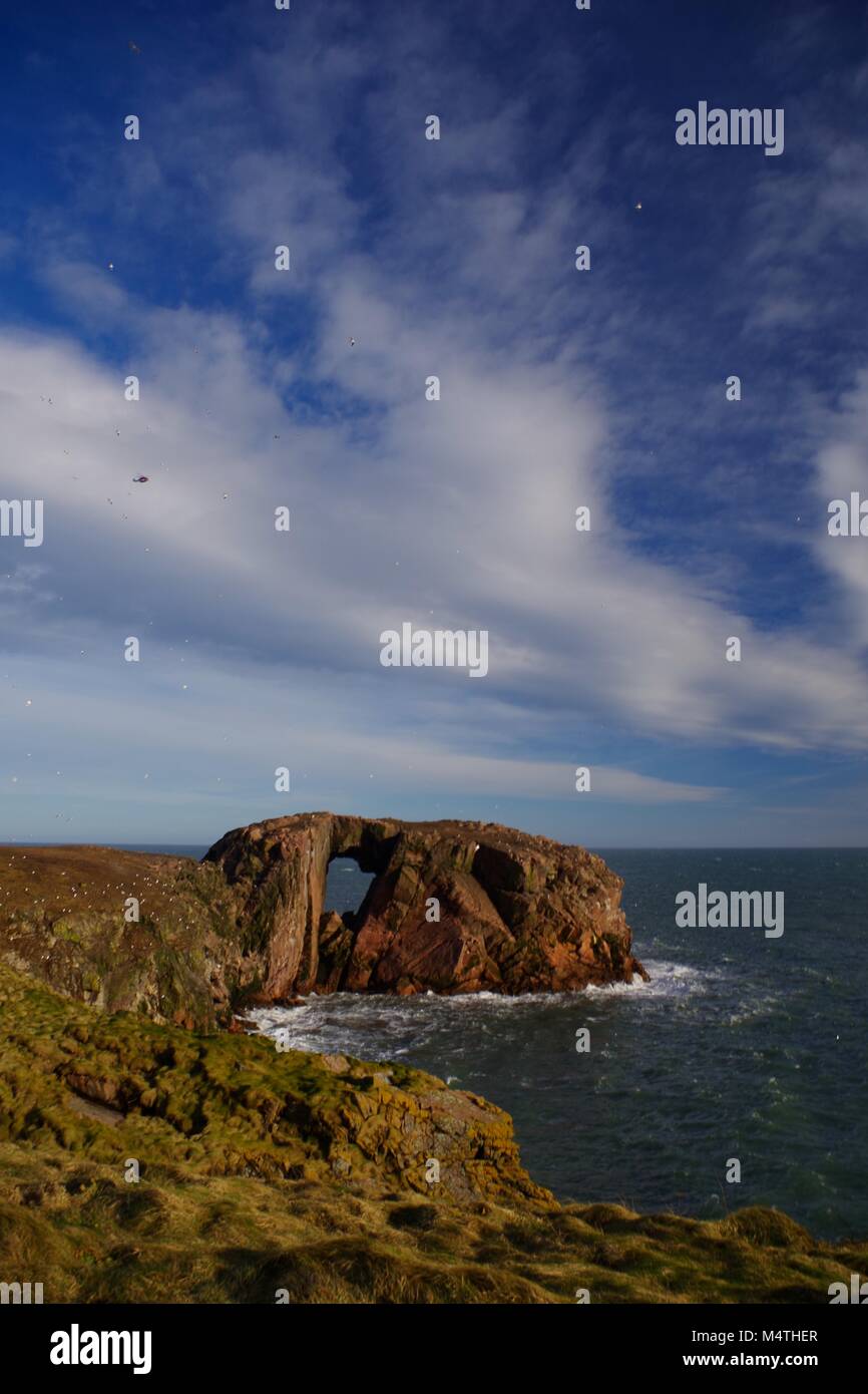 The Arch of Dunbuy, Natural Sea Arch Through a Pink Granite Islet along ...
