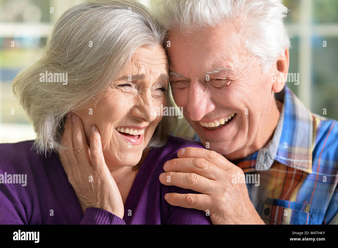 Close-up portrait of a happy senior Stock Photo - Alamy