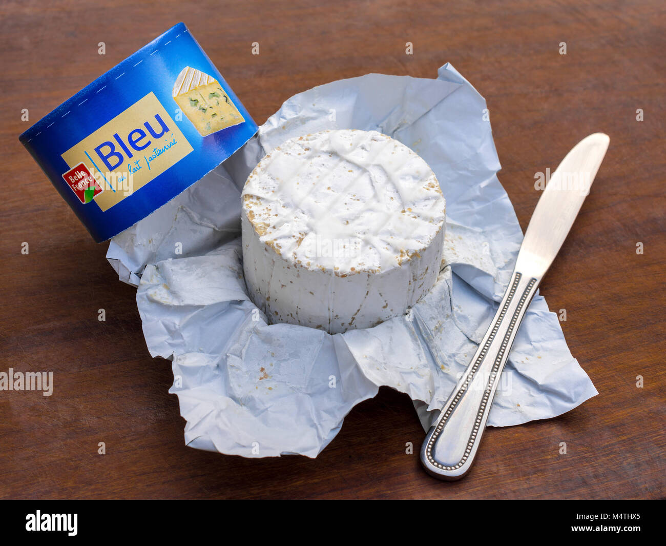 Commercial round Blue cheese, French Stock Photo - Alamy