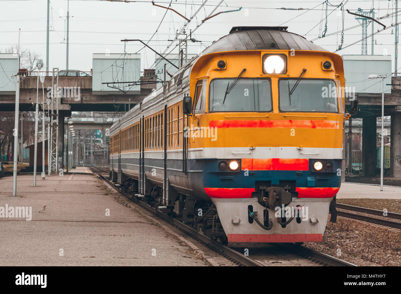 Yellow diesel train driving hi-res stock photography and images - Alamy