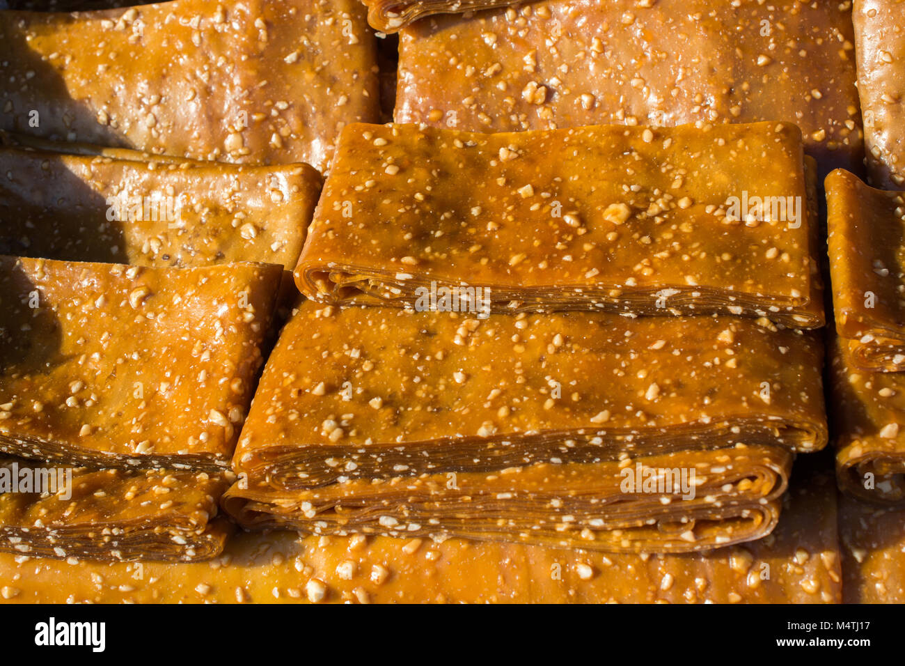Turkish style fruit dried pulp as snack food Stock Photo - Alamy