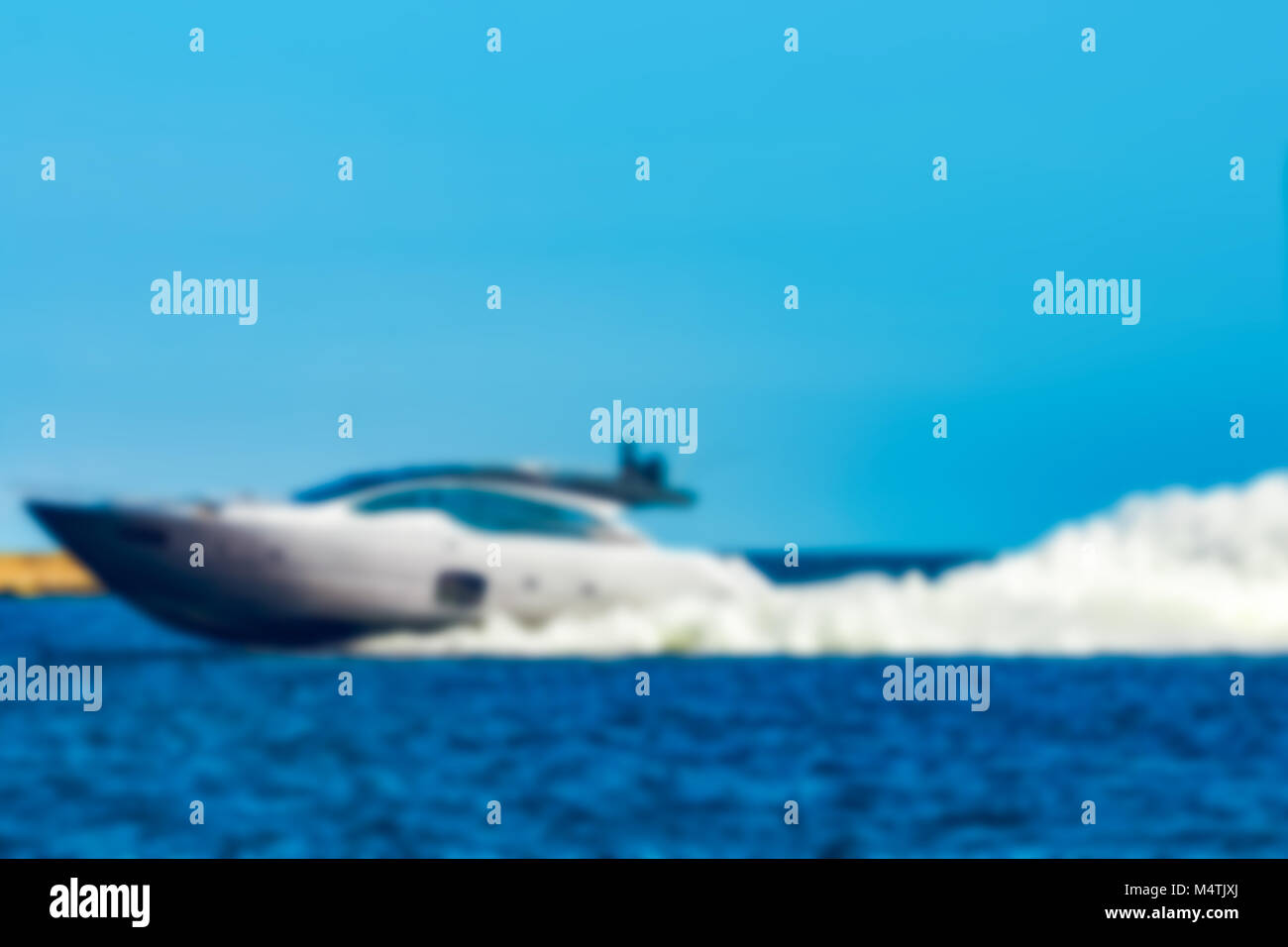 Speed boat - soft lens bokeh image. Defocused background Stock Photo ...