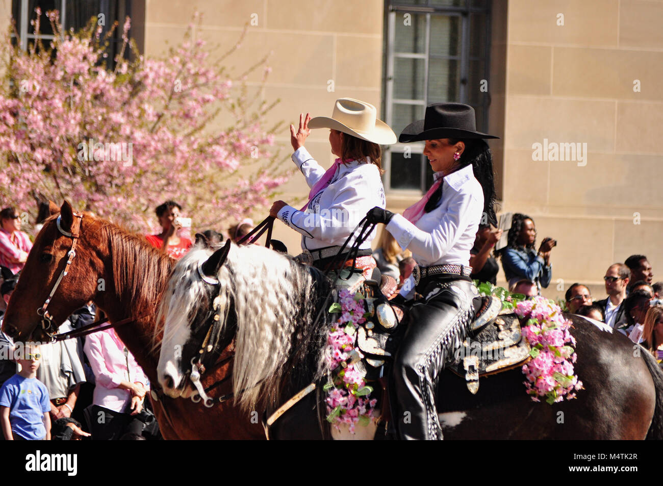 Female rodeo riders in Cherry Blossom Parade in Washington DC Stock ...