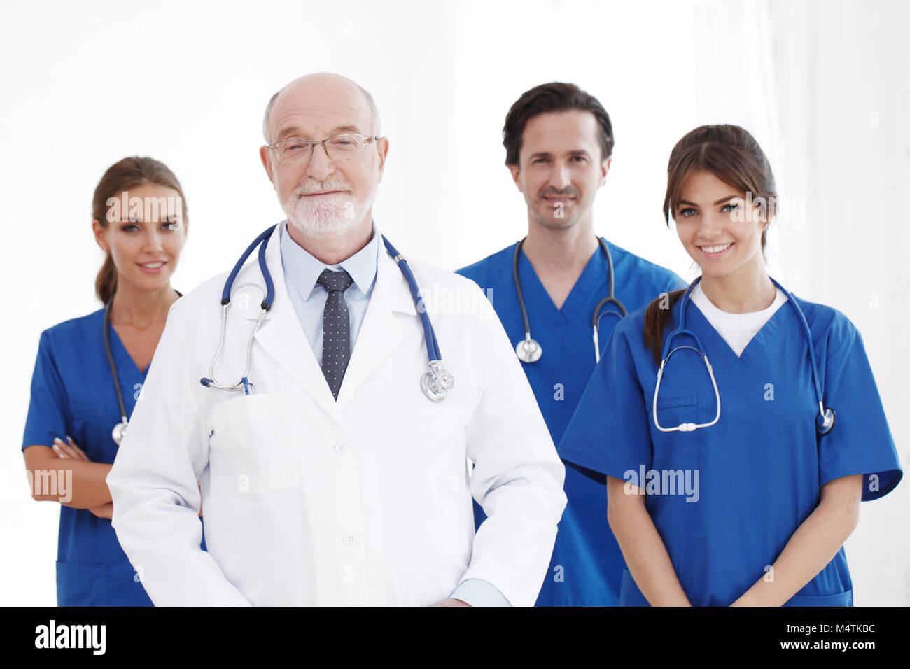 Team of professional doctors isolated on white background Stock Photo ...