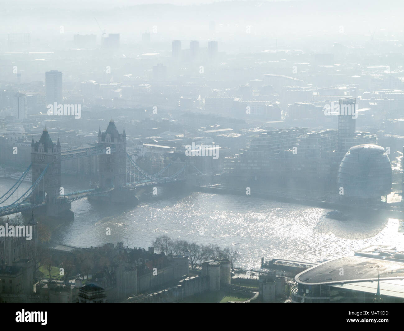 A cold and frosty dawn with air pollution over London's skyline with ...