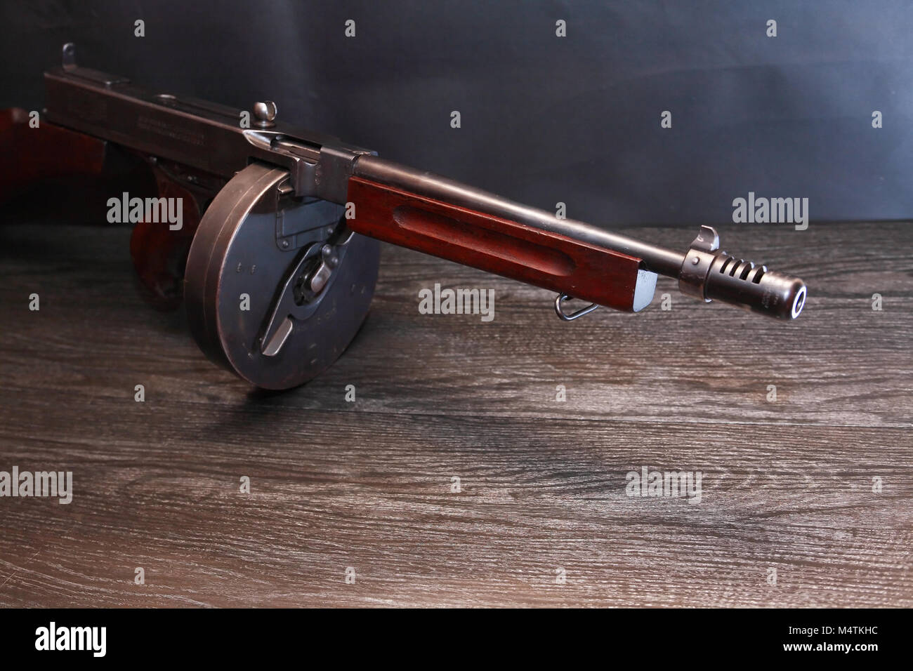 Old USA submachine gun closeup on dark background Stock Photo - Alamy
