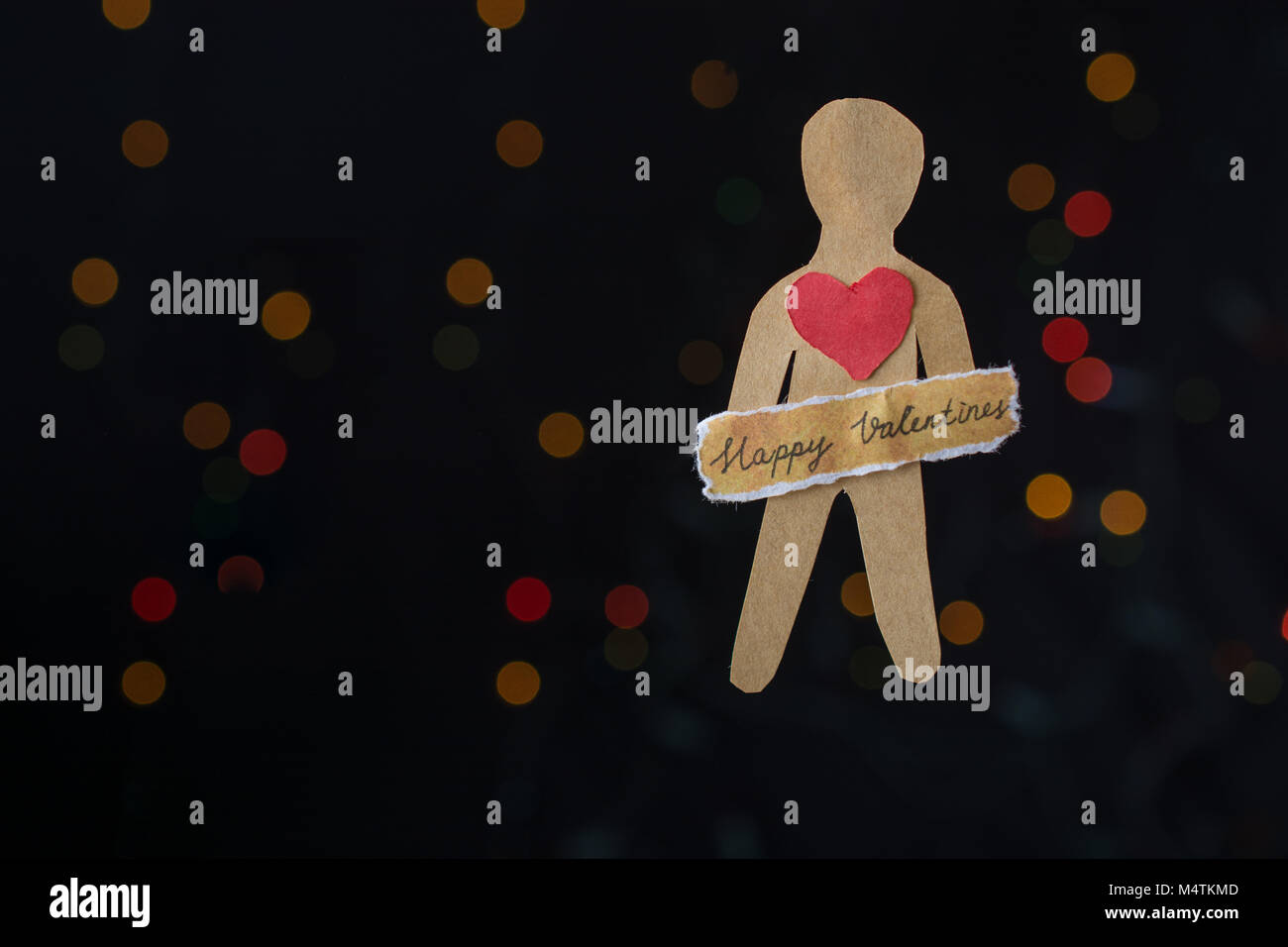 Valentine's day wording on torn paper as Love concept Stock Photo - Alamy