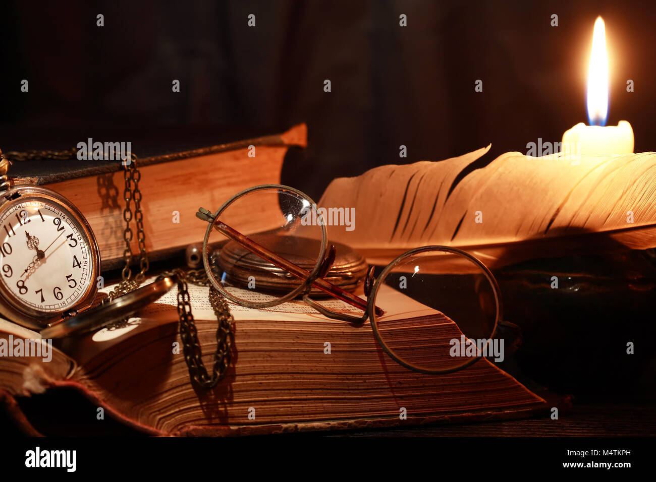 Old books candles hi-res stock photography and images - Alamy