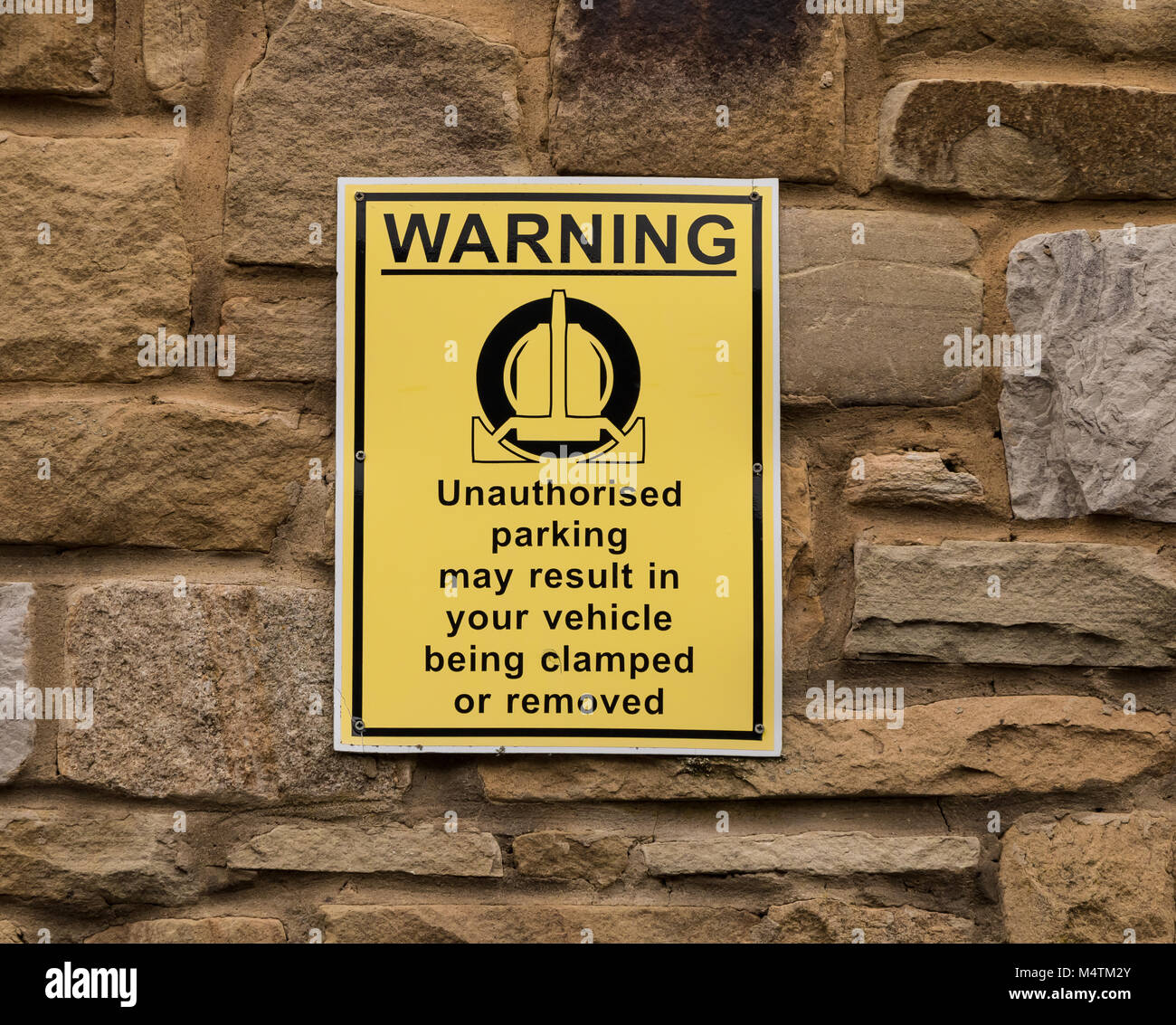 Unauthorised Parking warning sign with penalties for infringement Stock ...