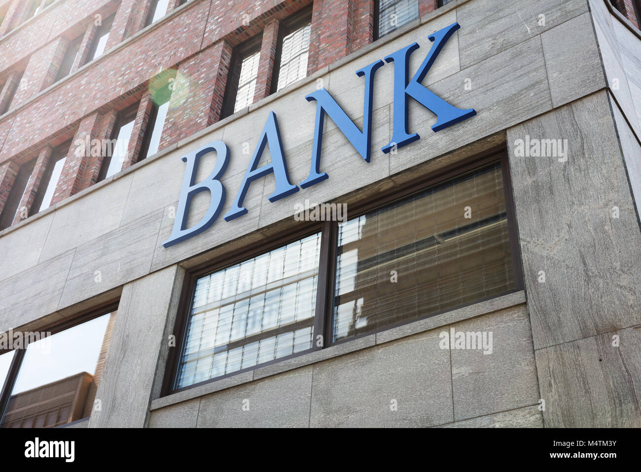 Low angle view of modern bank building in city Stock Photo - Alamy