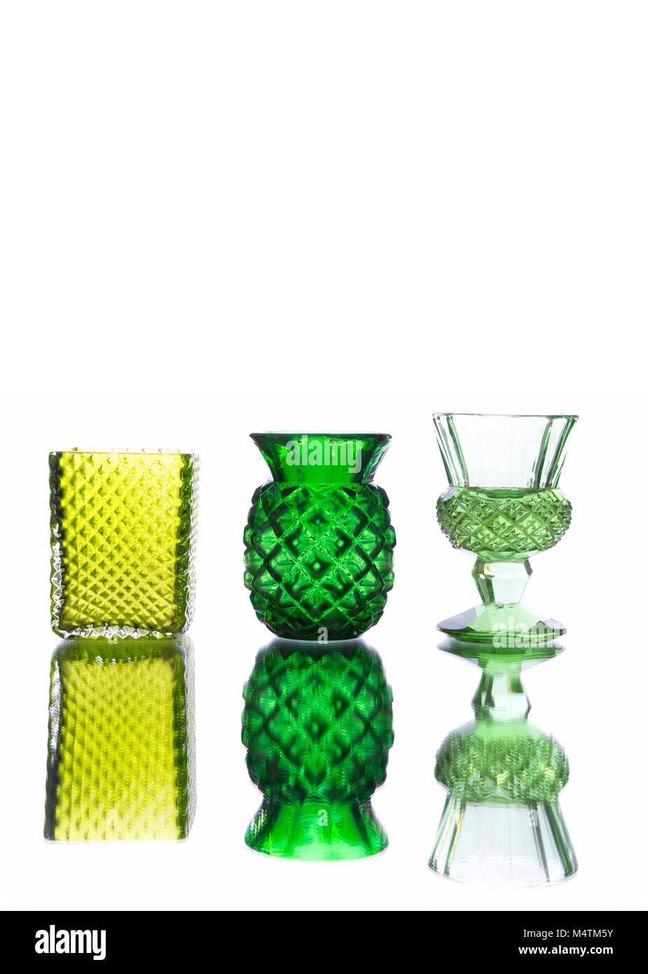 Antique colorful glass isolated on white background Stock Photo - Alamy