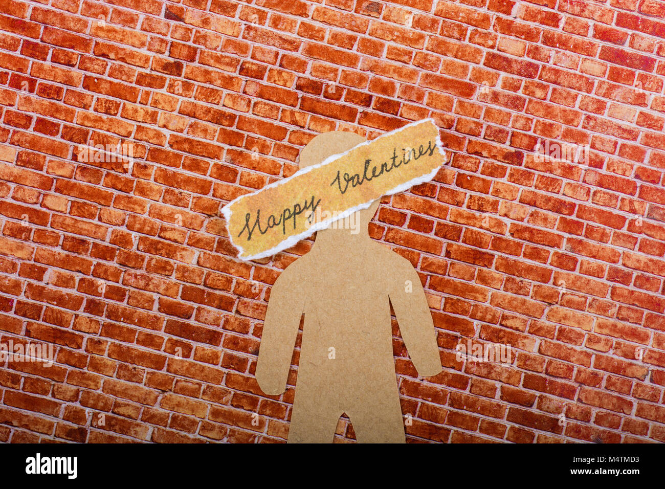 Valentine's day wording on torn paper as Love concept Stock Photo - Alamy