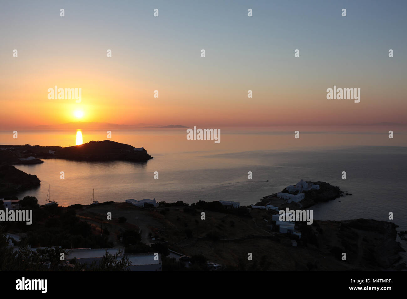 Sunrise in Chrysopigi village, facing the monastery of Panagia of ...
