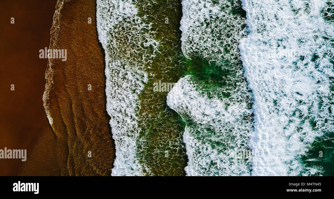 Aerial View From Flying Drone Of Ocean Waves Crushing On Beach Stock ...