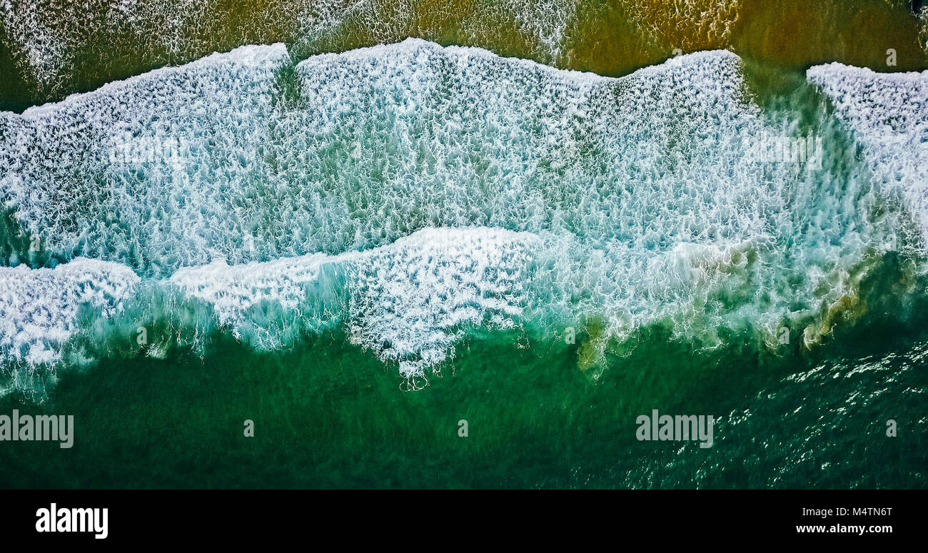 Aerial View From Flying Drone Of Ocean Waves Crushing On Beach Stock ...