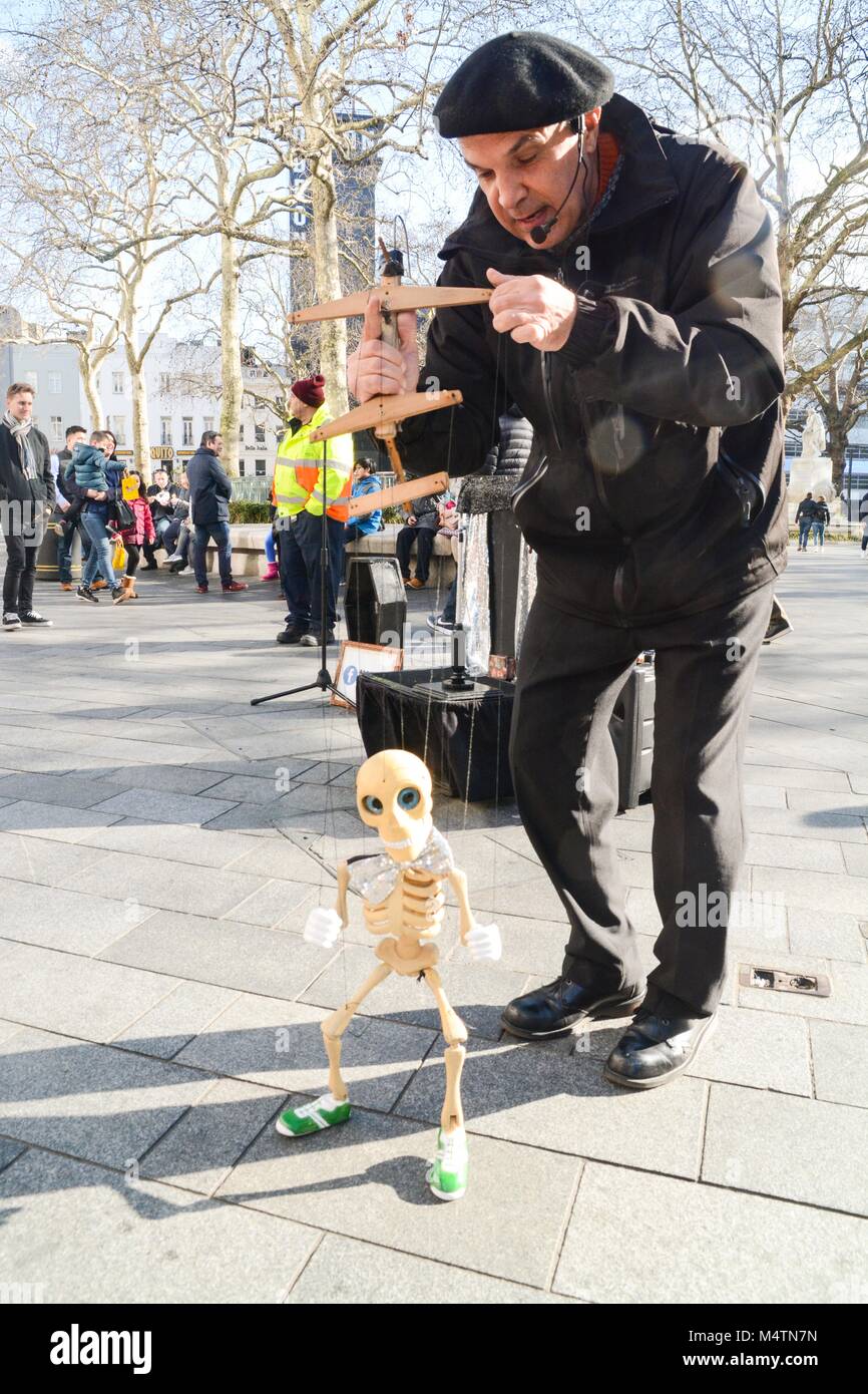 Richard handley and Master bones his handler busking in Leicester ...