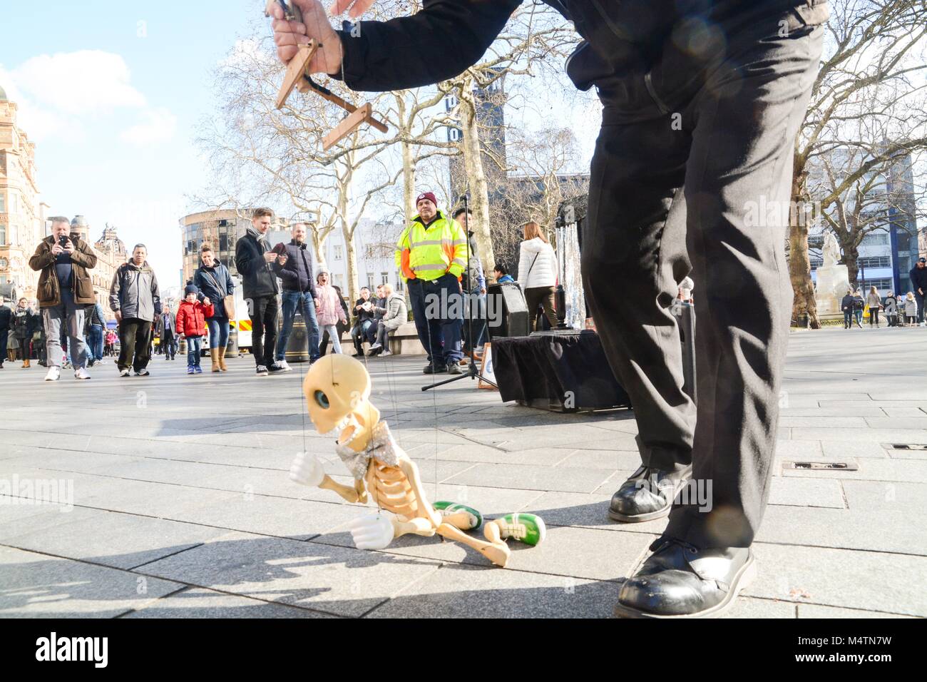Richard handley and Master bones his handler busking in Leicester ...