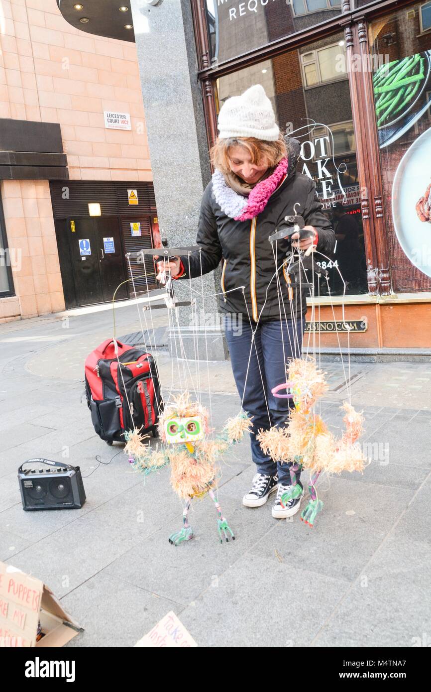 Richard handley and Master bones his handler busking in Leicester ...