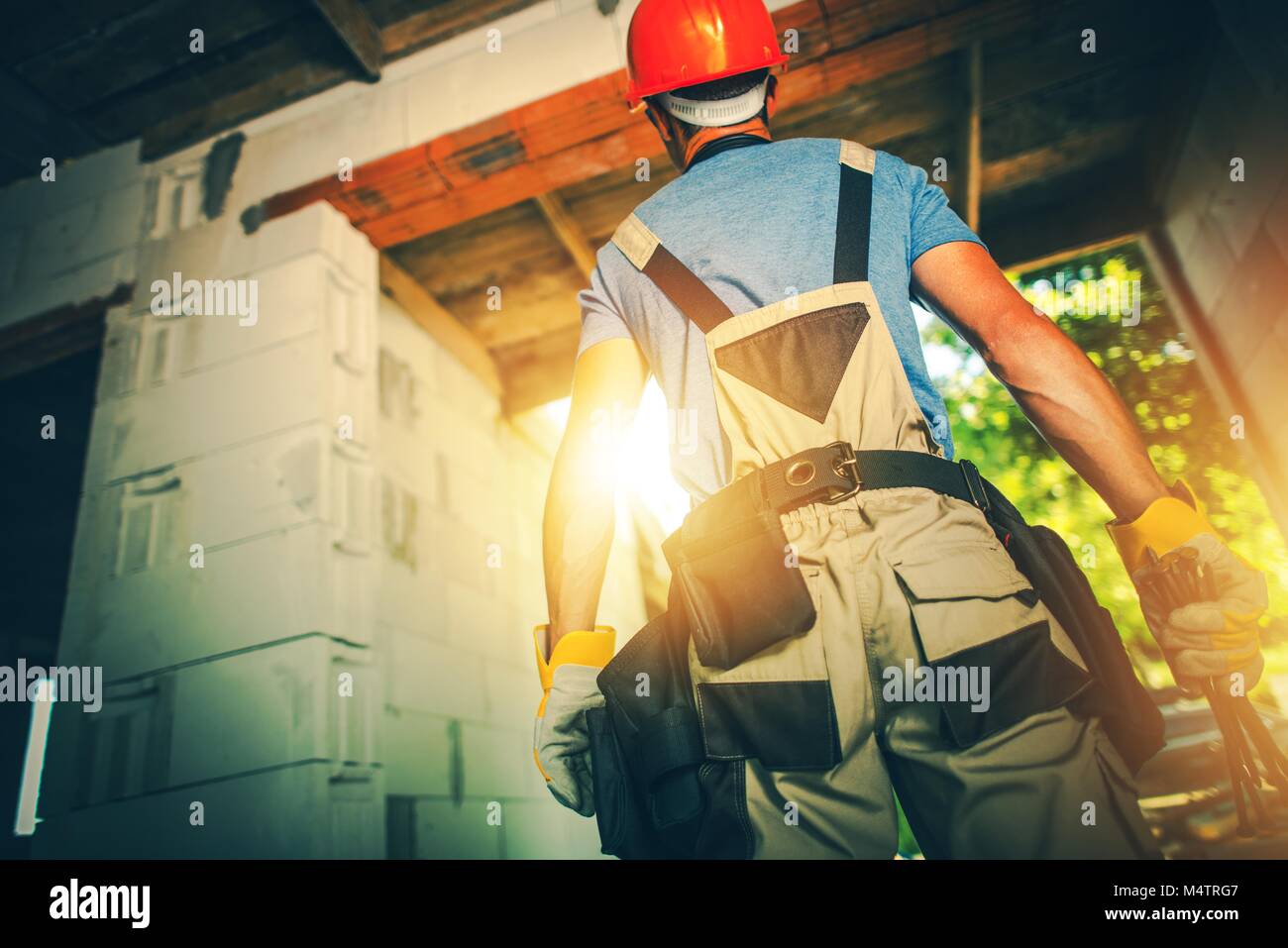 Building Contractor at Work. Caucasian Construction Site Worker with ...