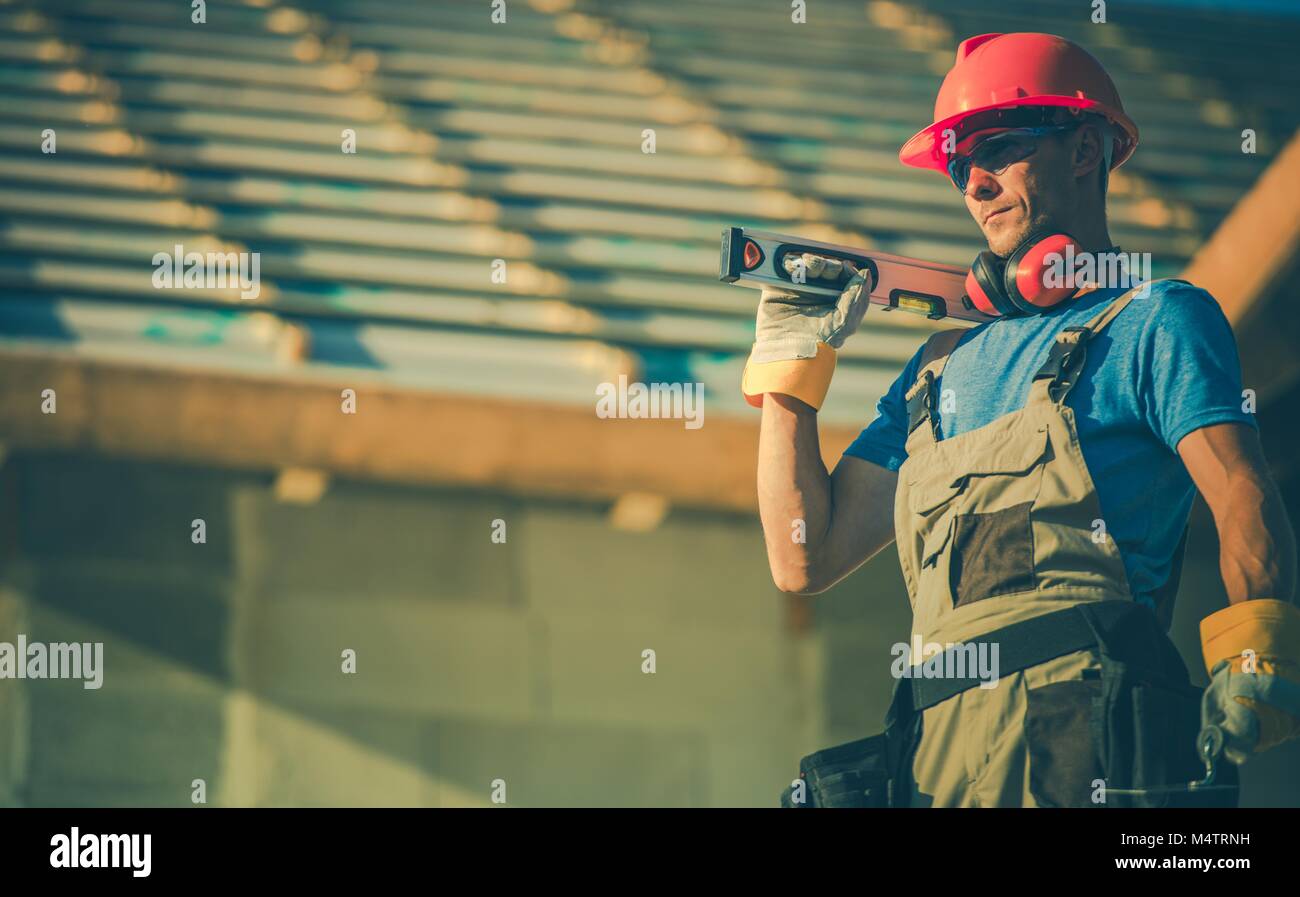 Caucasian Builder with Tools. Construction Site Worker Stock Photo - Alamy