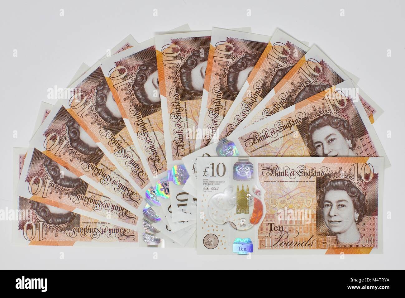 The new £10 polymer banknotes on a white background Stock Photo - Alamy