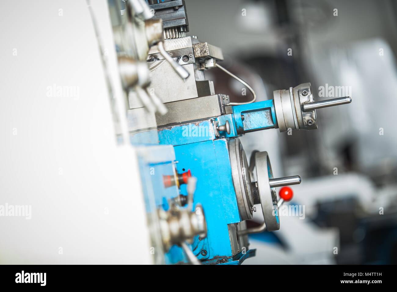 Metalworking Lathe Machine Adjustment Wheels. Industrial Machines Theme ...