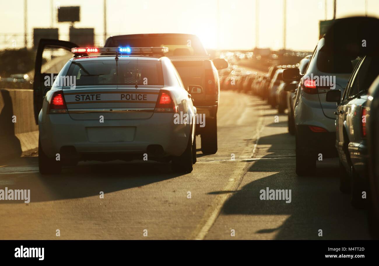 Police Traffic Stop. Policeman Stop Speeding Vehicle on the Side of the ...