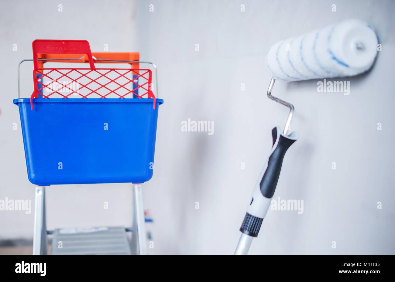 Room Painting Equipment. Paint Bucket, Ladder and Roller Stock Photo ...