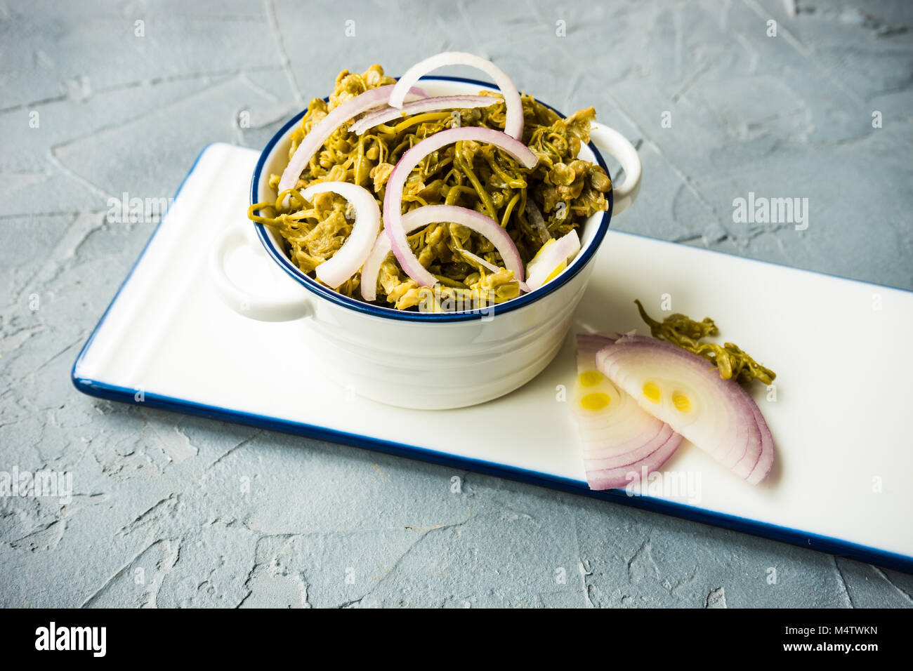 Traditional georgian dish - jonjoli, on rustic table with copyspace ...