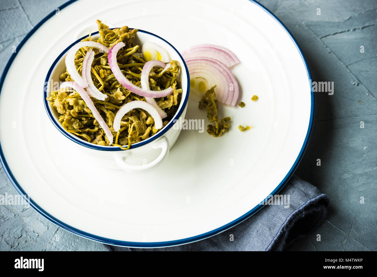Traditional georgian dish - jonjoli, on rustic table with copyspace ...