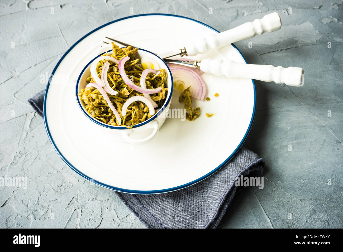 Traditional georgian dish - jonjoli, on rustic table with copyspace ...