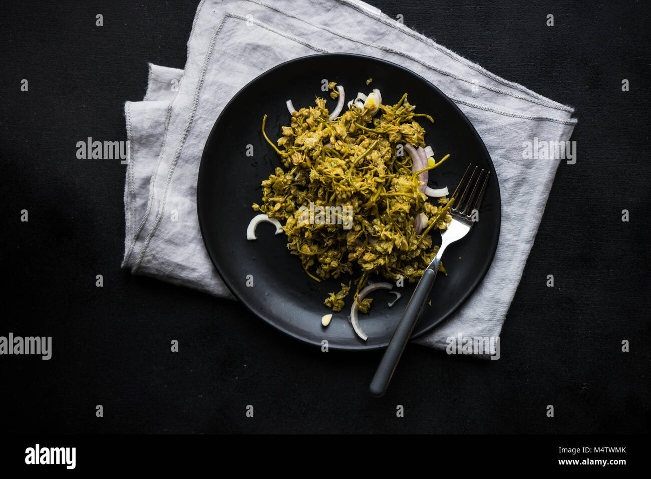 Traditional georgian dish - jonjoli, on rustic table with copyspace ...