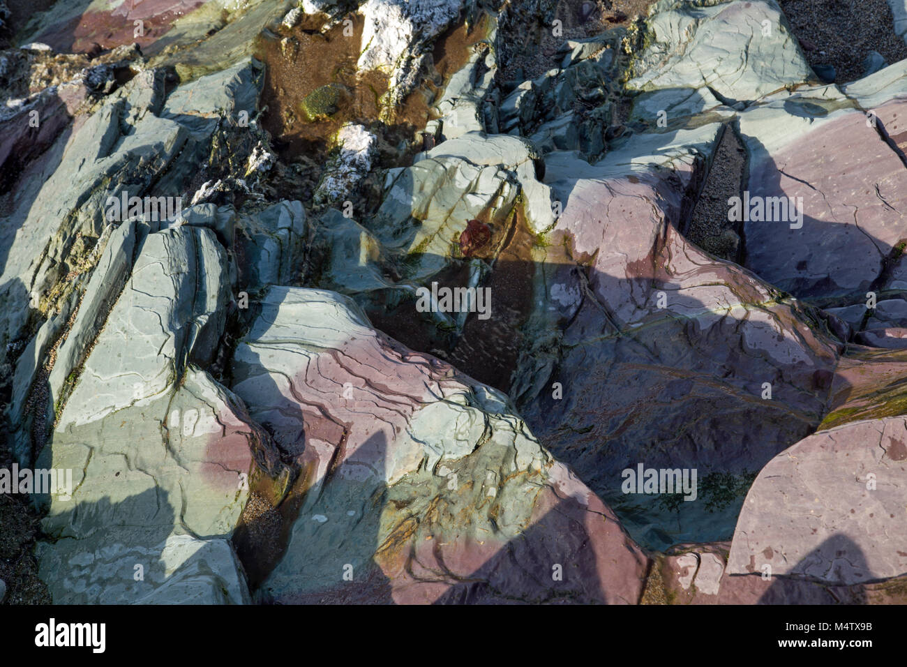 Rugged colourful rocks Stock Photo - Alamy