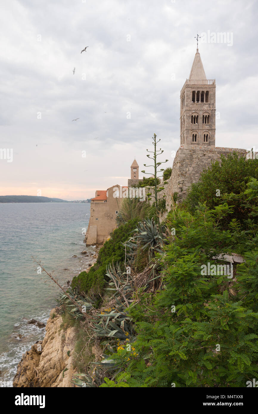 Shoreline view on Rab town with towers and fortifications Stock Photo ...