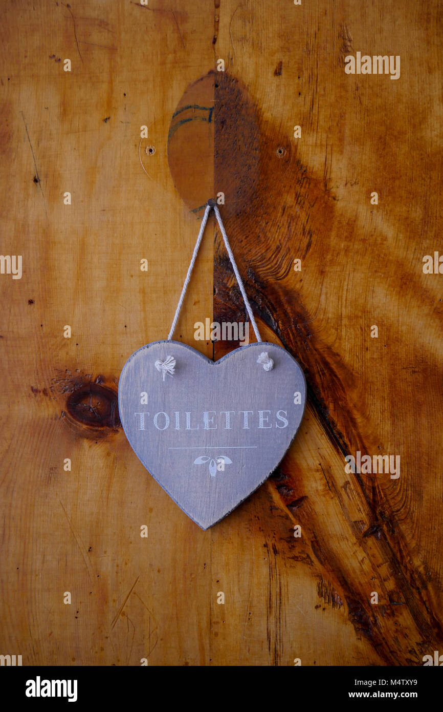 Hanging toilet sign hi-res stock photography and images - Alamy