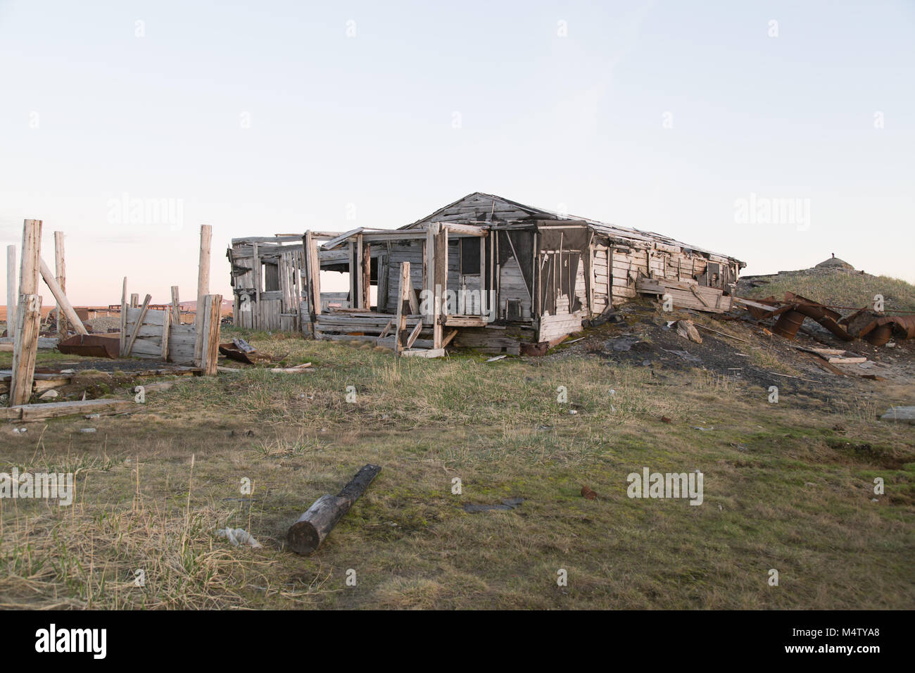 The old wooden destroyed house without windows Stock Photo - Alamy