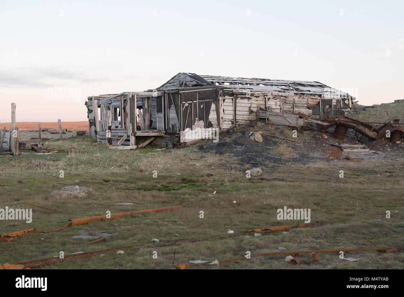 The old wooden destroyed house without windows Stock Photo - Alamy