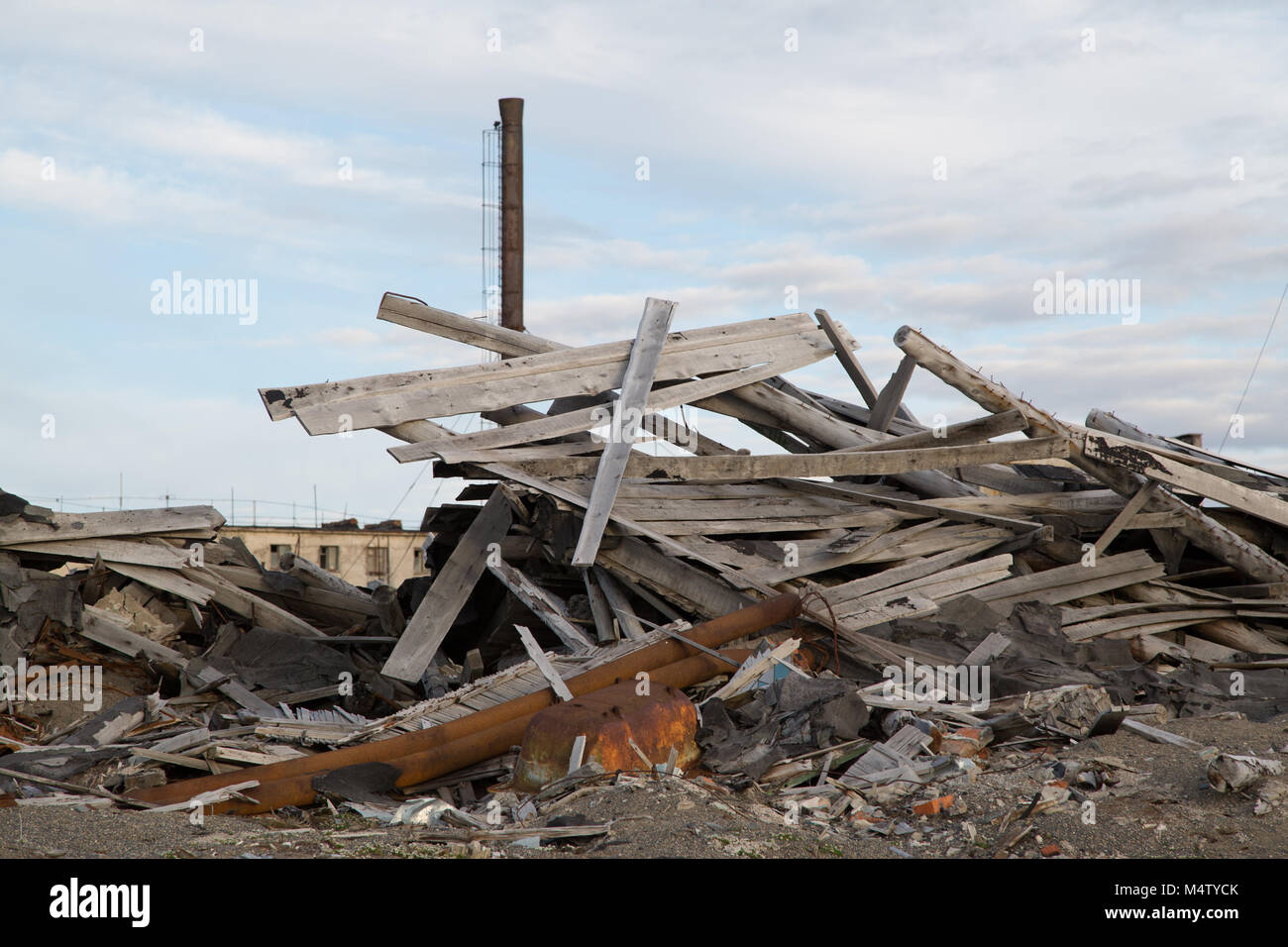 Mountain of garbage from logs, wooden boards and scrap metal Stock ...