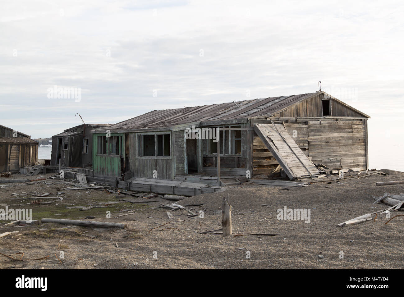 The old wooden destroyed house without windows Stock Photo - Alamy